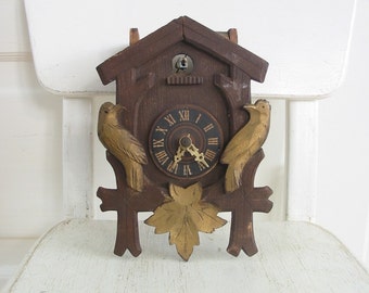 Cuckoo clock bird | Etsy
