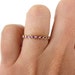 2.2mm Bezel Set Round Ruby Eternity Band in 18k by ZinaFineJewelry
