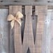 Barn Wood Letters measuring 24 inches tall with burlap bow