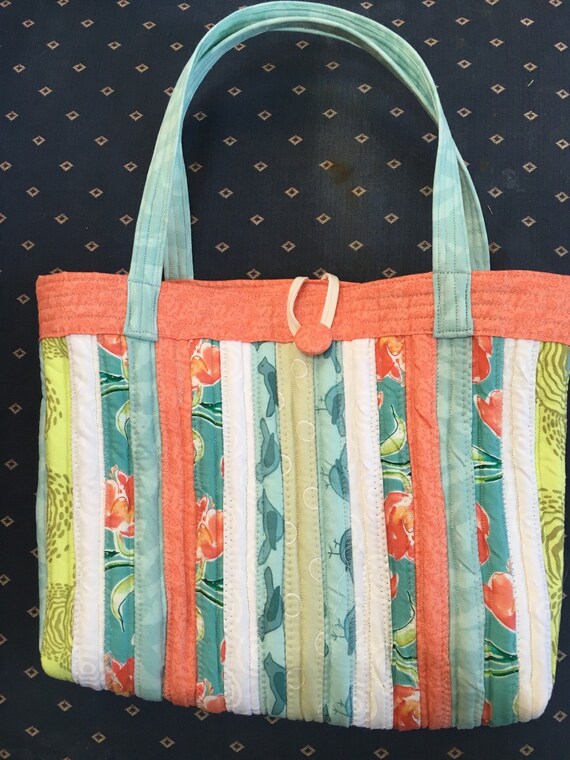 Items similar to Cloth tubular padded handbag on Etsy