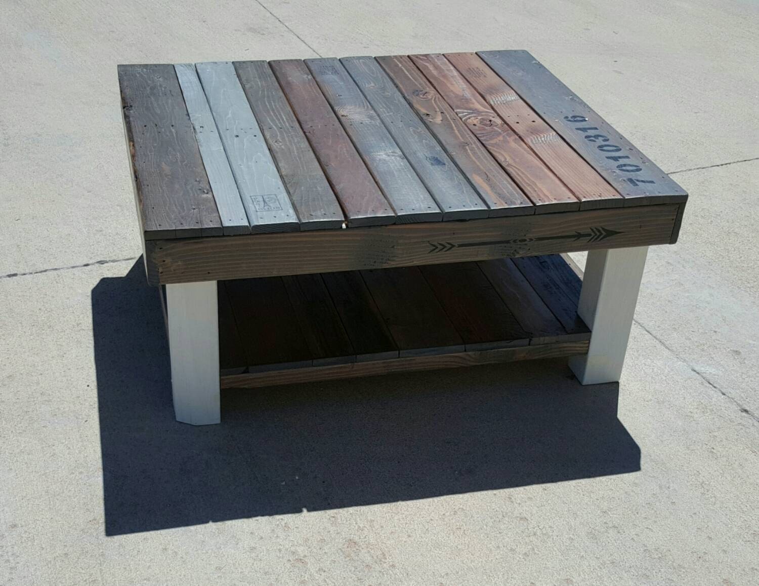 Reclaimed wood coffee table with multi-colored stain and lower