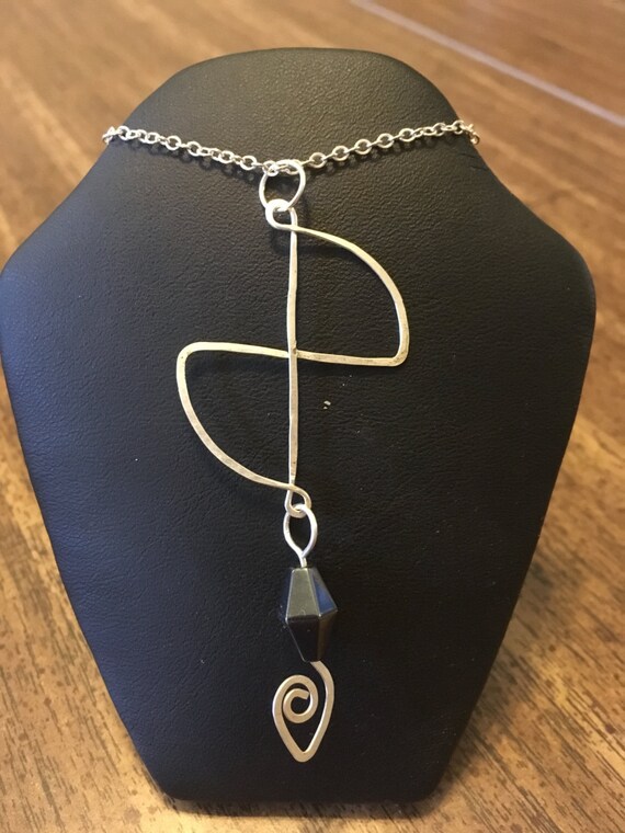 Items similar to Forgotten Realms Holy Symbol - Pendant of Gond on Etsy