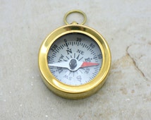 Popular items for gold compass pendant on Etsy