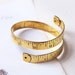 Gold Measure Tape bangleGold Measure Tape by linenjewelryshop