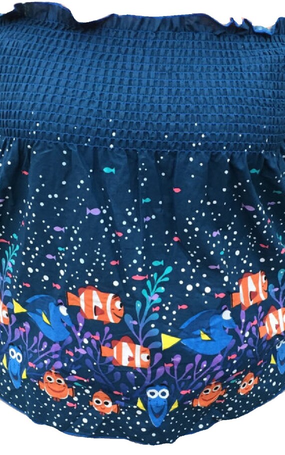 Items similar to FINDING DORY Mock Smock Fabric by the HALF Yard on Etsy