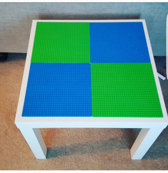 Lego table and 1 blue stool with storage bins