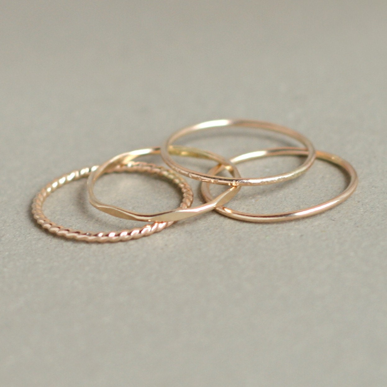 GOLD stacking rings. SET of four. skinny slim. stack ring.
