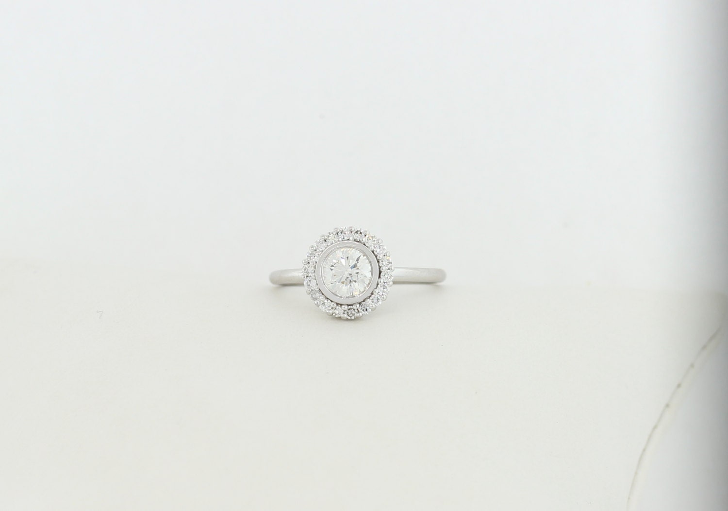Half Carat Halo Set Diamond Ring Round Brilliant Cut Diamond
