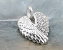 Unique angel wing necklace related items | Etsy