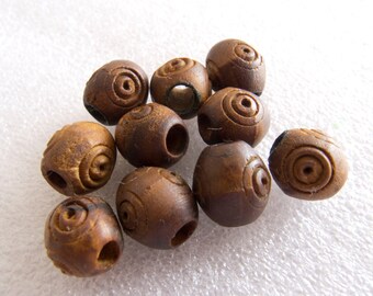Carved wood bead | Etsy