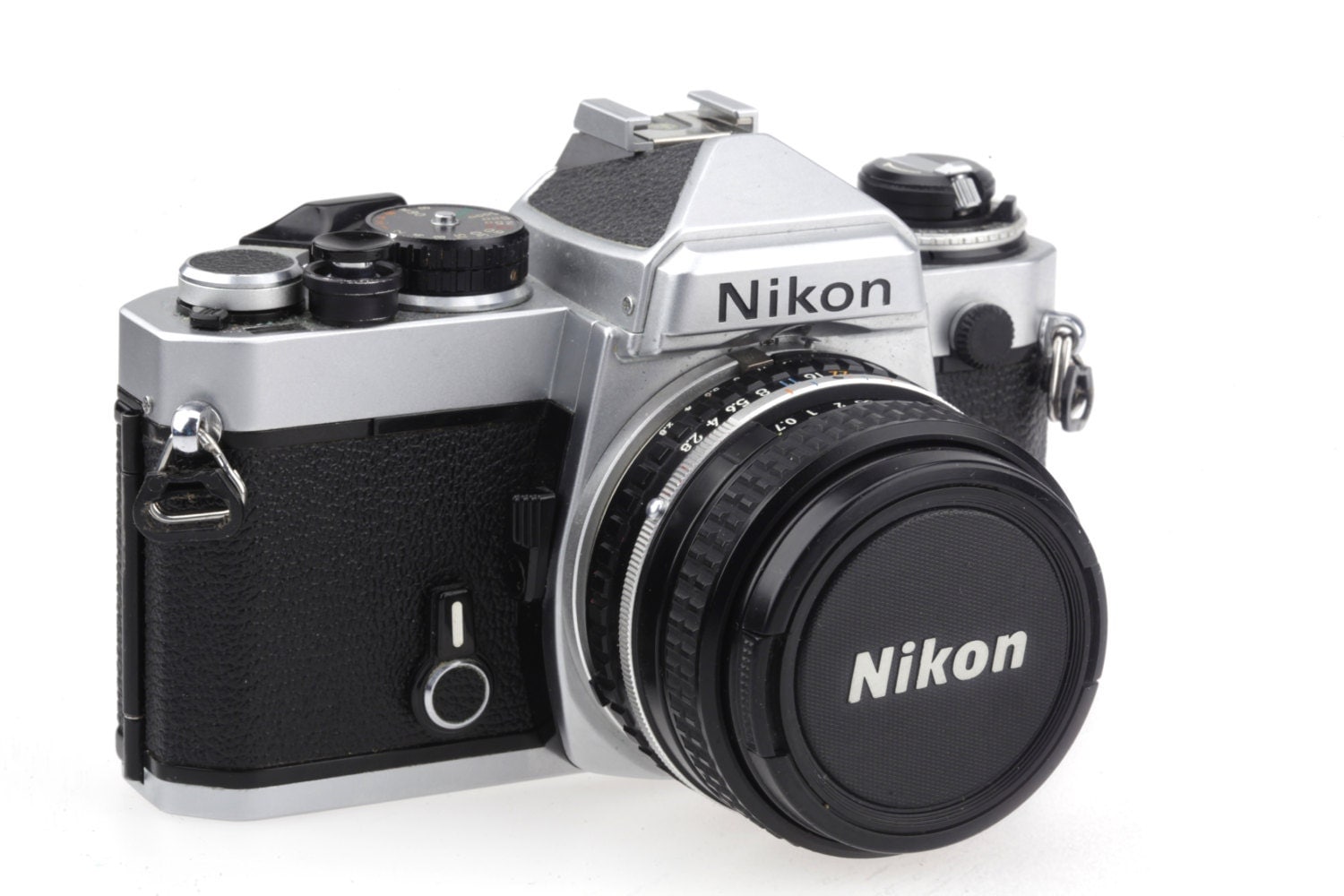 Nikon Fe With The Nikon Series E 28mm 1:2.8 / by fcollectables