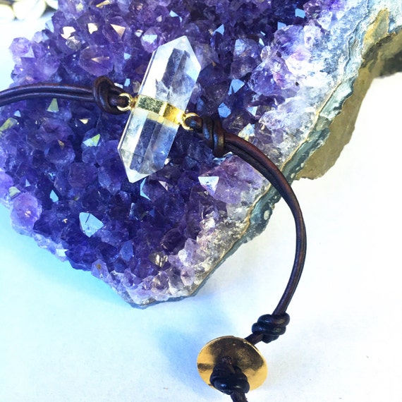 Items similar to Bezel Set Quartz Crystal Point on Leather Bracelet on Etsy