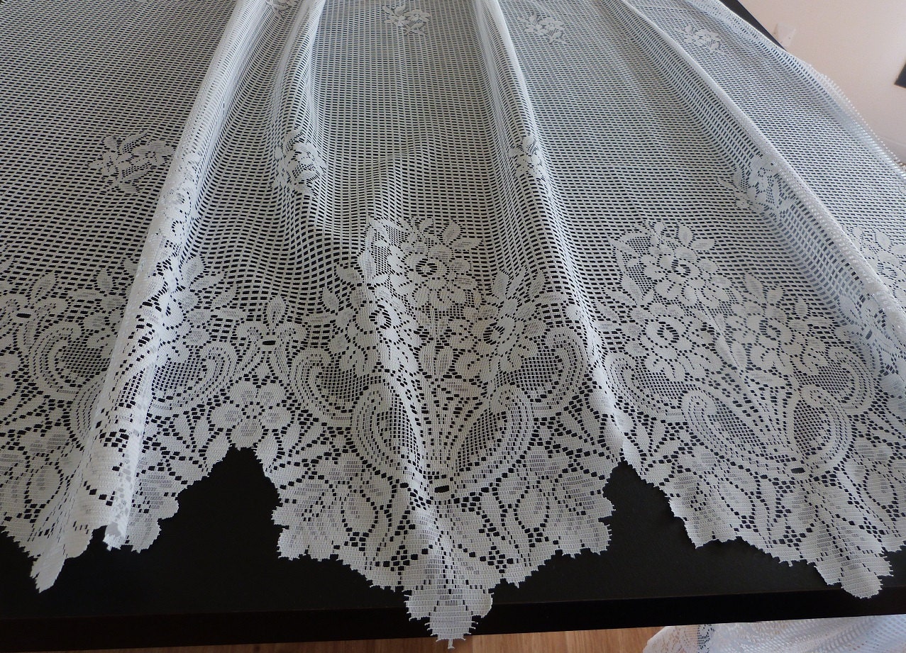 Beautiful scalloped edge lace net curtains made in France