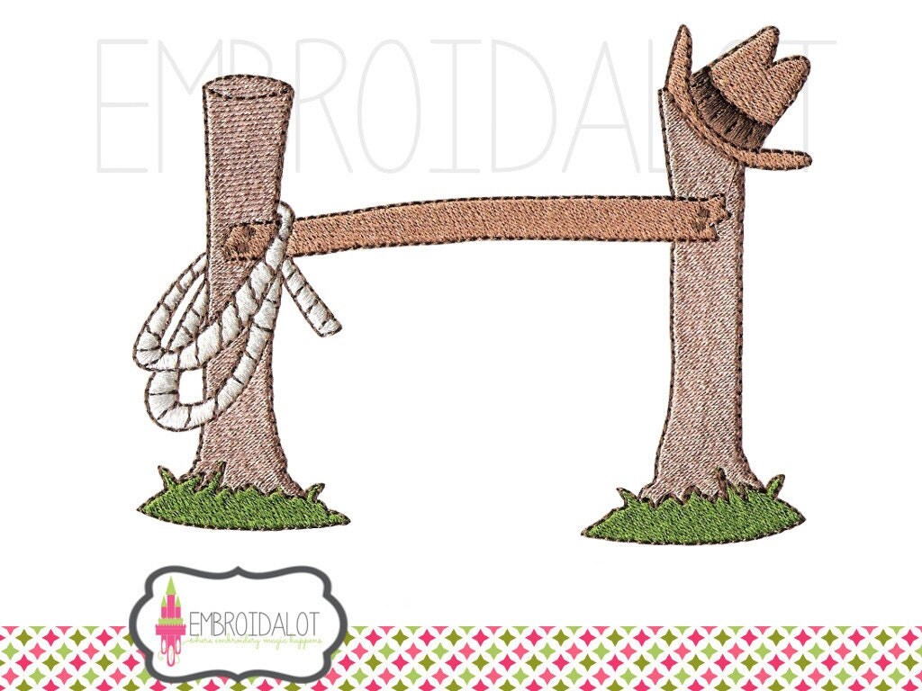 Cowboy machine embroidery design. Hitching post with lasso and