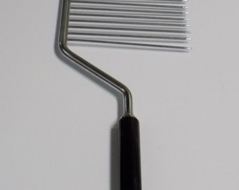 Bakelite cake cutter | Etsy