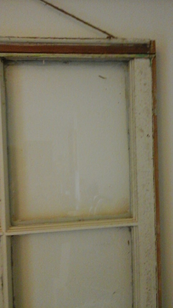 Vintage old 6 panel window with twine