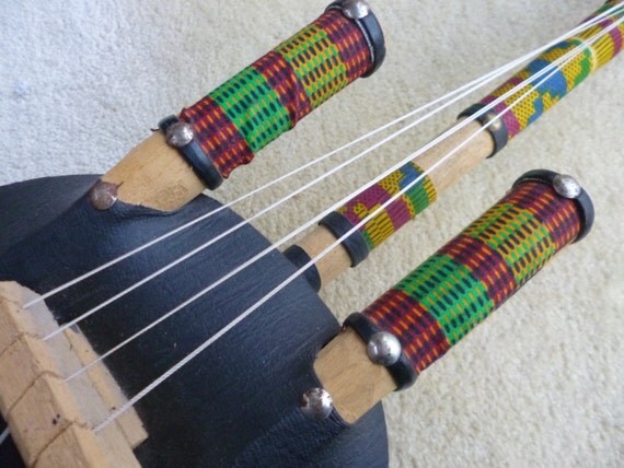 The Kora is a musical instrument made in Nigeria sort of the