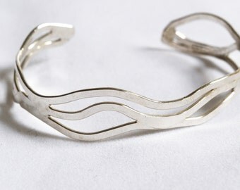 Items similar to Silver Wave Cuff Bracelet on Etsy
