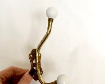 Antiqued wall hooks | Etsy