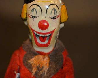 Wind up clowns | Etsy