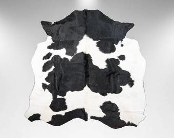 White cowhide rug | Etsy