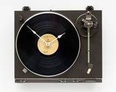 stuff made from stuff clocks made from recycled by pixelthis