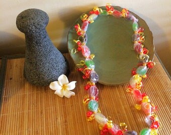 Items similar to Edible School Graduation Candy Lei with Money on Etsy