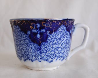 Flow blue tea cup | Etsy