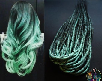 Set of crochet synthetic double ended dreads. Glows in the