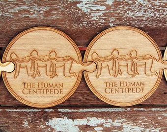 Items similar to The Human Centipede necklace on Etsy