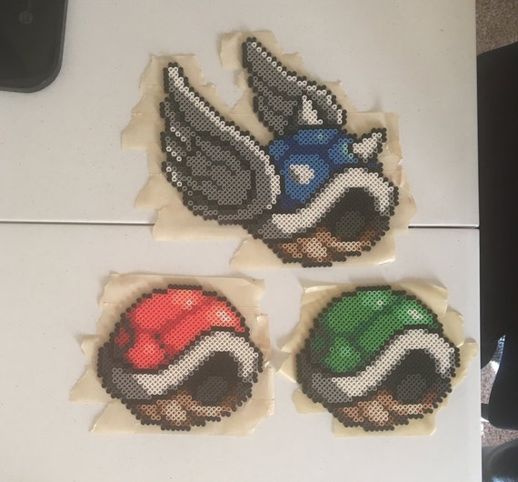 Items similar to Mario Kart green, red, and blue shells perler bead art ...