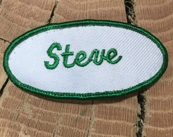 Zack. A yellow work shirt patch that says Zack in