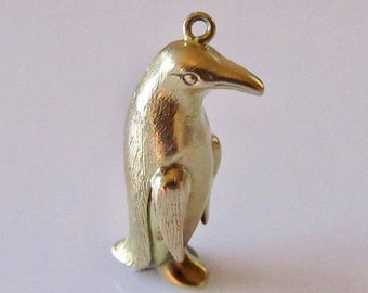 Gold penguin | Etsy
