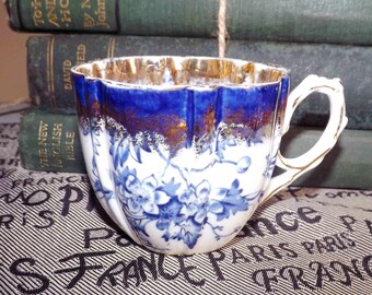 Flow blue tea cup | Etsy