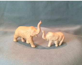 Faux ivory elephant | Etsy