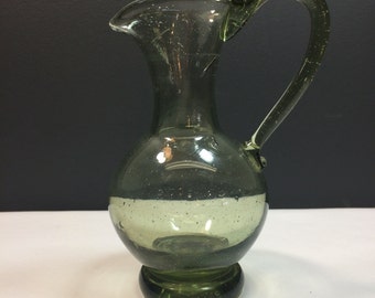 Green glass pitcher | Etsy