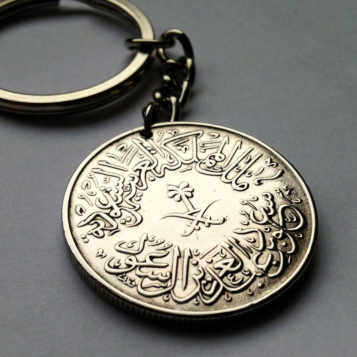 1956 Saudi Arabia 4 Qirūsh coin pendant Arabic crossed swords