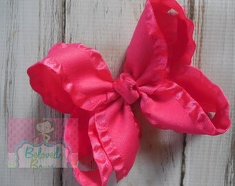 Items similar to Girls hot pink double ruffle hair bow on Etsy