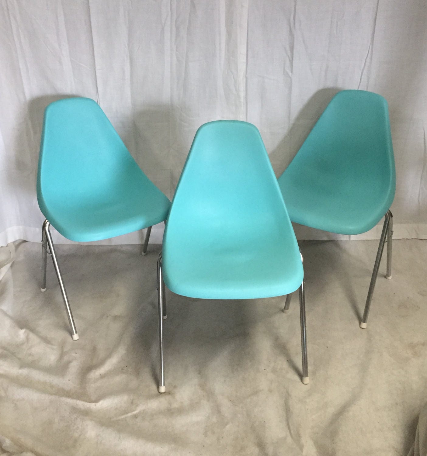 Vintage 1960s stacking chairs Set of three molded plastic