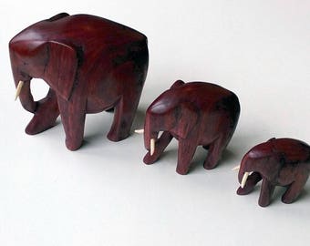 Carved wood elephant | Etsy