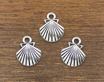 Seashell charms | Etsy