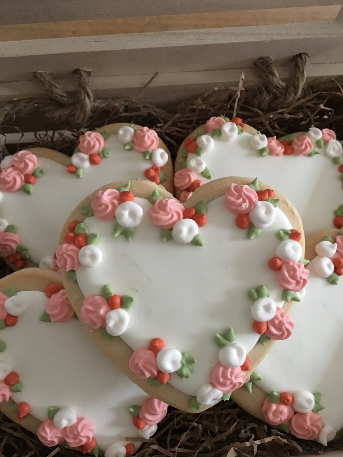 Heart shaped Royal icing sugar cookies packed in a small