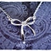 Small Silver Bow Necklace Sterling Silver Bow Charm on a