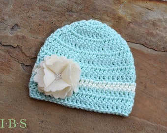 Items similar to Festive Spring Beanie with Flower on Etsy