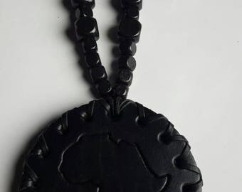 Africa medallion | Etsy