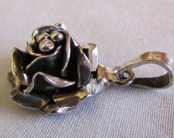 Items similar to Wire sculpture pendant, large rose design. Silver ...
