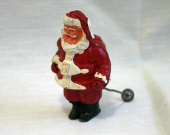 Cast iron santa | Etsy