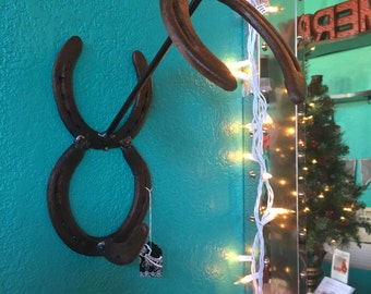 Horseshoe hat rack | Etsy