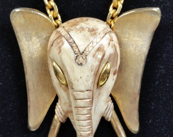 Faux ivory elephant | Etsy
