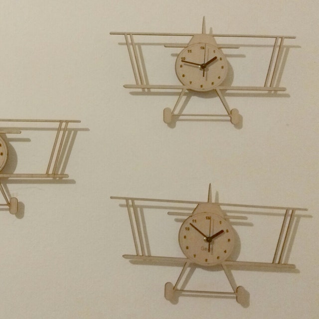 Wooden wall clocks by LaserCust on Etsy
